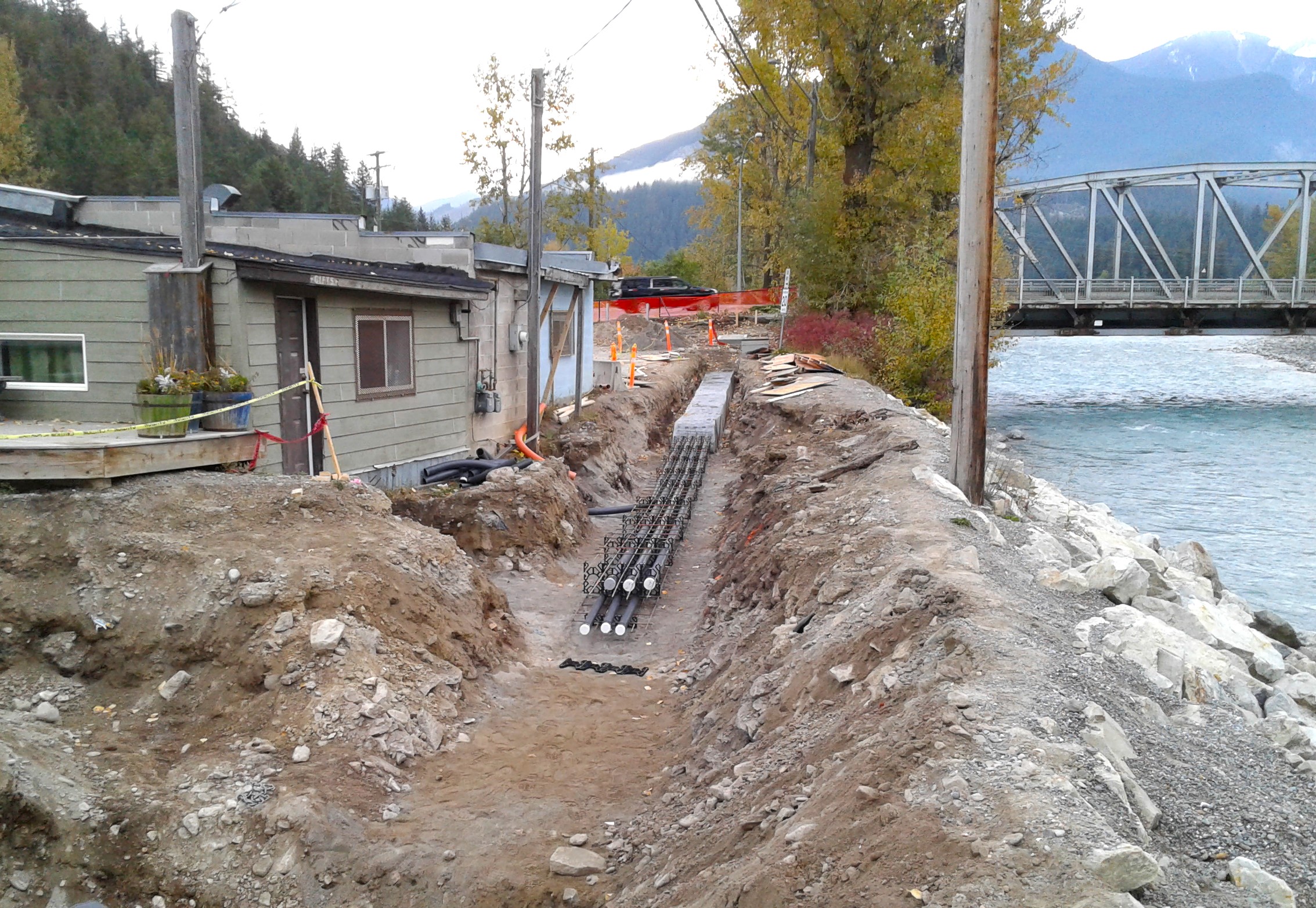 Shallow Utilities & Dike Improvements - Carver Construction Ltd.